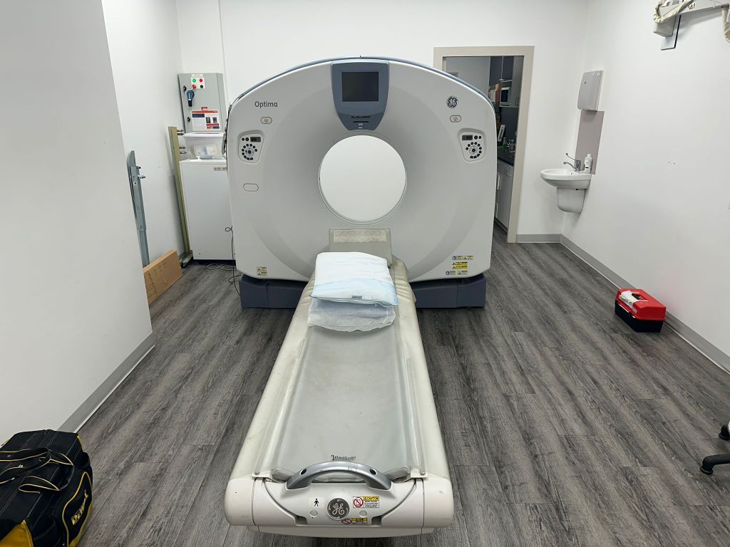 GE Optima 520 16 Slice - EverX | Used Medical Imaging Equipment – CT ...